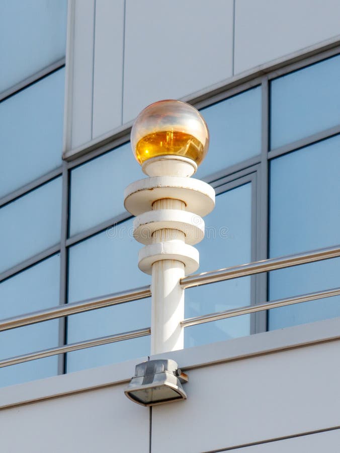 A Tall White Pole with a Yellow Ball on Top Stock Image - Image of blue ...