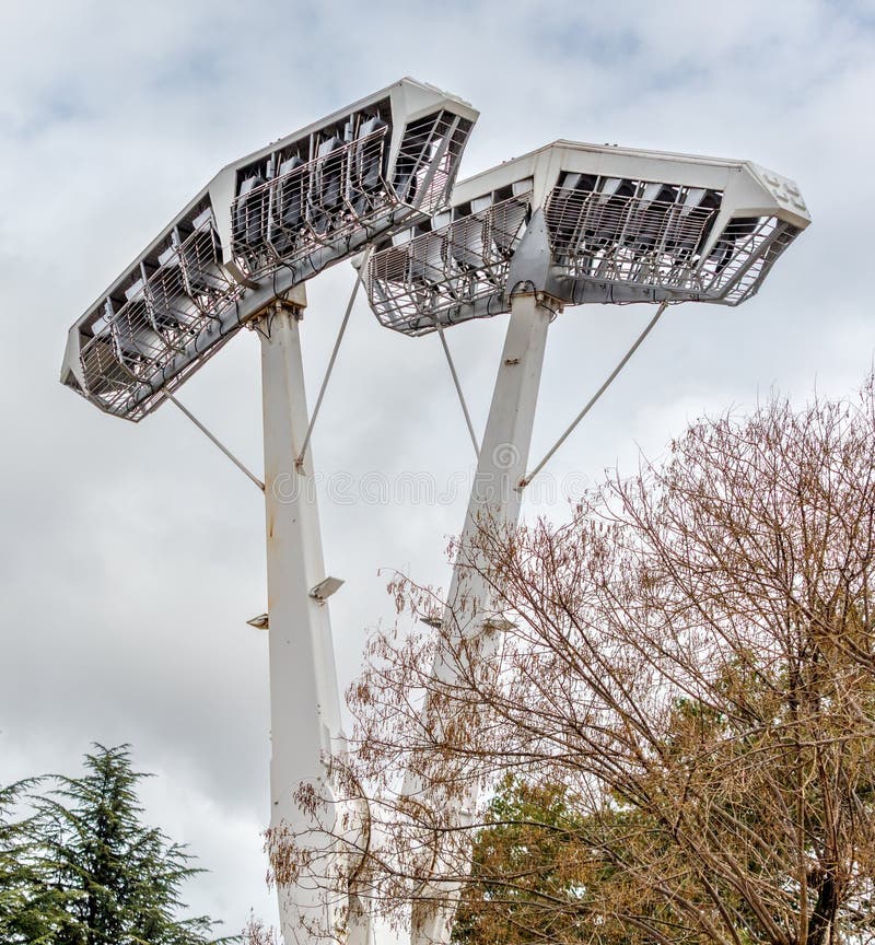A Tall White Structure with Two Sets of Lights on Top Stock Image ...