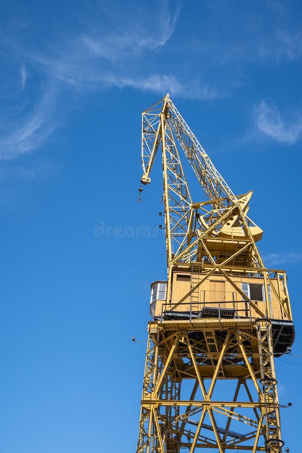 Tall Yellow Construction Crane with Clear Blue Sky, Tool or Machine To ...