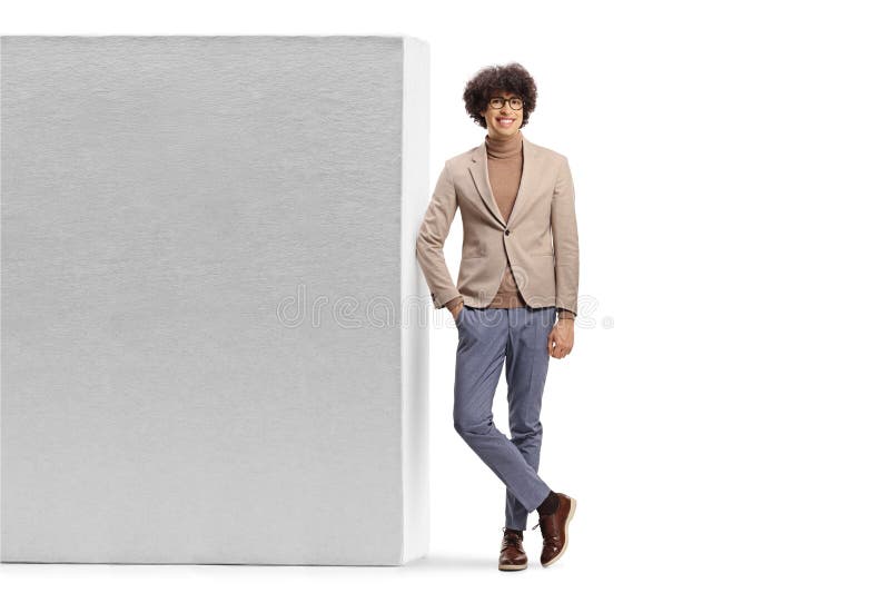 Tall Young Man Leaning on a Wall and Smiling Stock Image - Image of ...