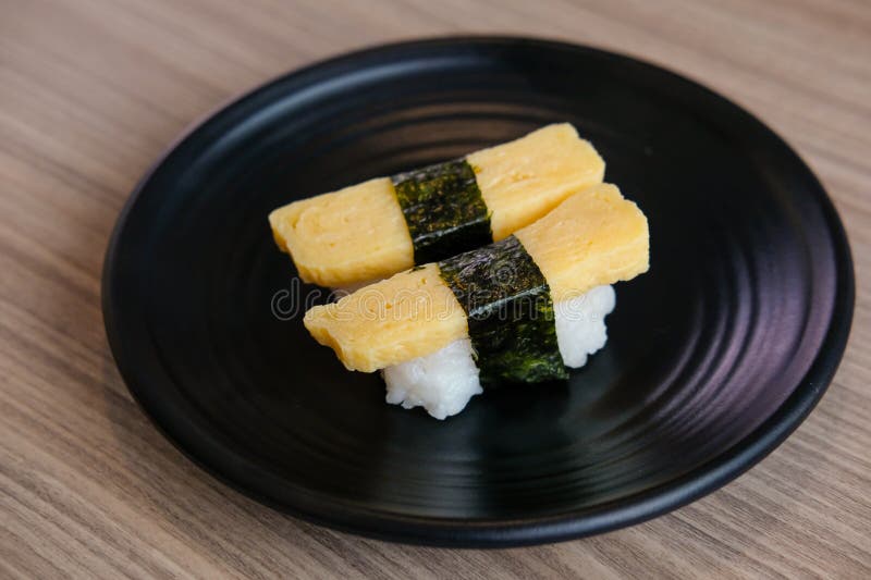 Tamago Egg Sushi, Egg Omelet on Sushi Rice Stock Photo - Image of ...
