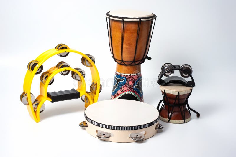 Tambourine and Other Percussion Musical Instruments, Shot on a White ...