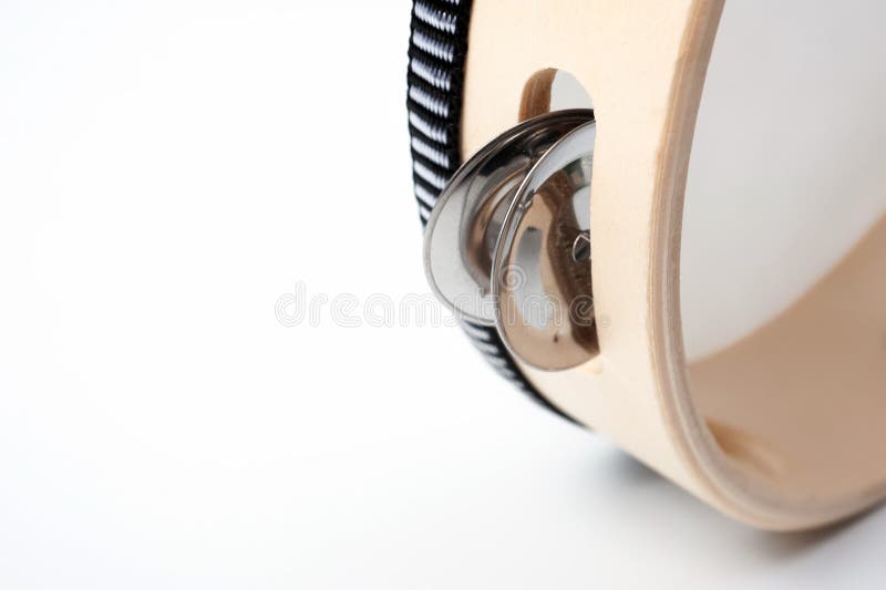 Tambourine is a Percussion Musical Instrument, Shot on a White ...