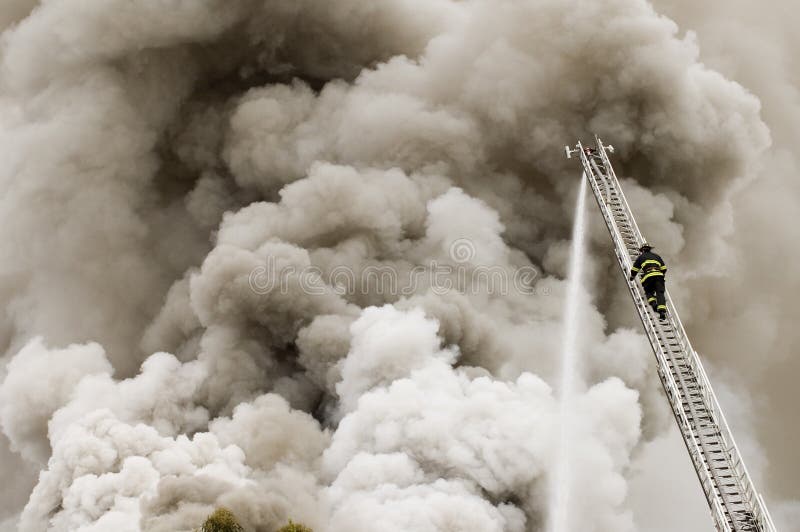 Tame a Raging Fire stock image. Image of smoke, extinguish - 2302875