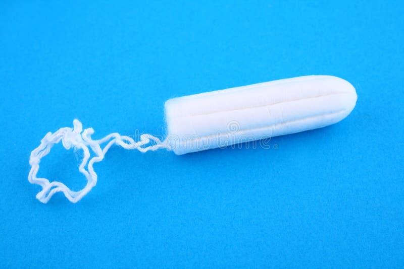 Tampon over blue stock photo. Image of white, monthlies - 3077440