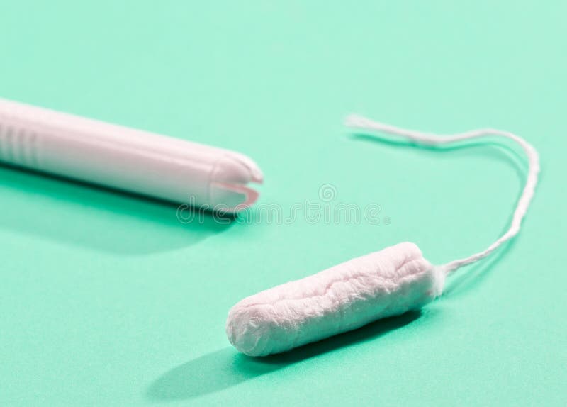 Tampon on Pastel Green Background Stock Image - Image of self, medical ...