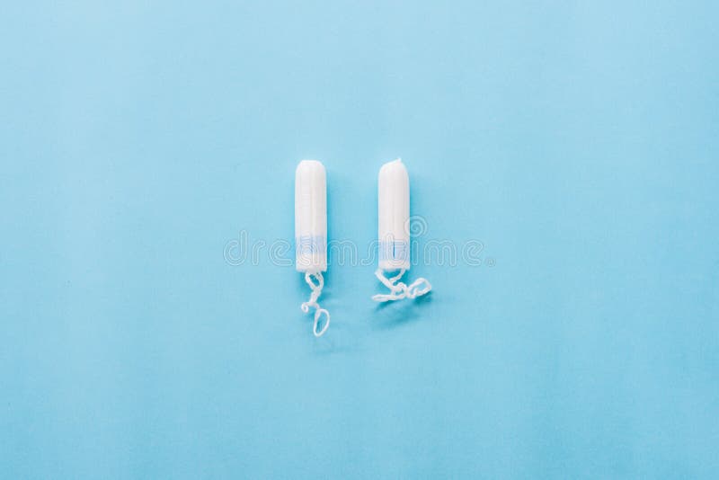 Tampons on blue background stock image. Image of tampon - 188483517