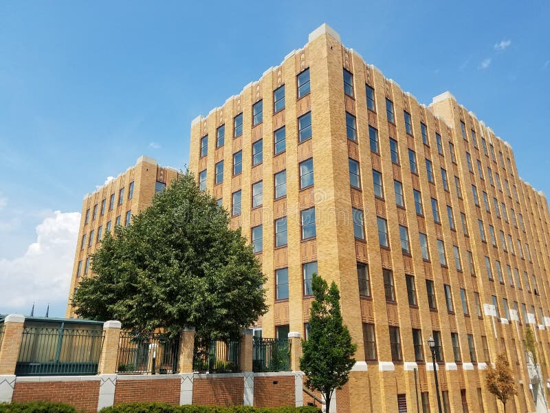 Tan brick building stock photo. Image of condominium - 97519686