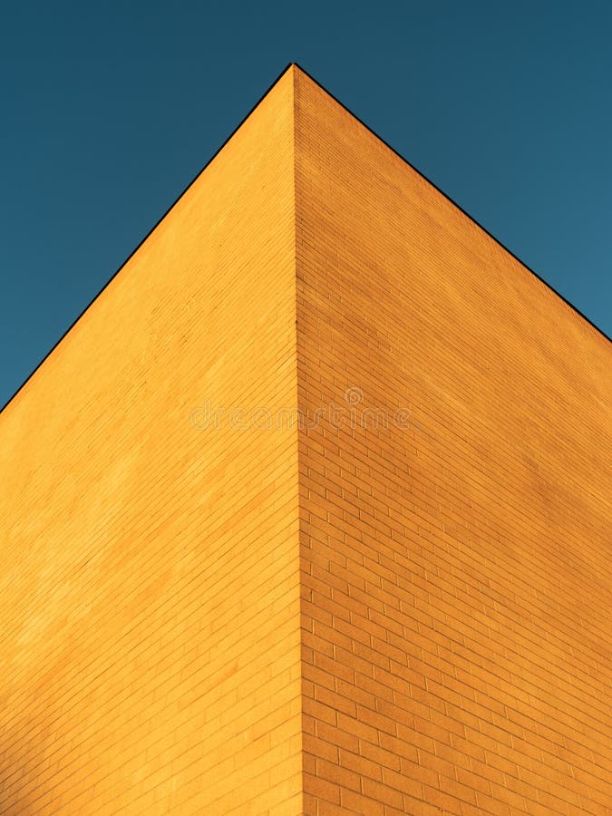 Tan Brick Wall Corner To Blue Sky - Center Stock Image - Image of ...