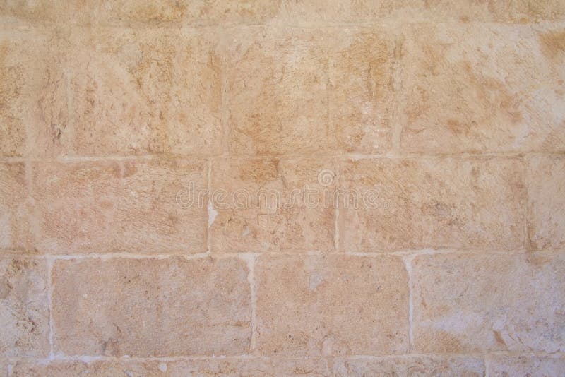 Tan Stone Wall stockbild. Bild von architektur, steine - 80919657