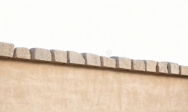 A Tan Wall with a Decorative Stone Border Stock Photo - Image of ...