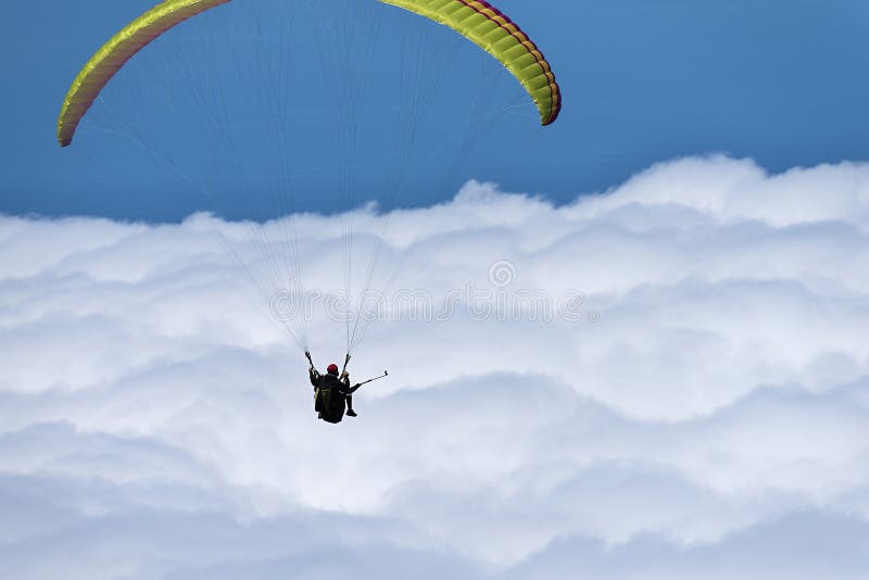 Tandem Flight Above the Clouds Stock Photo - Image of wind, clouds ...