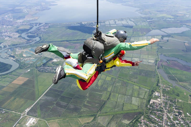 Skydiving Photo Tandem Jump in Free Fall. Stock Photo - Image of ...