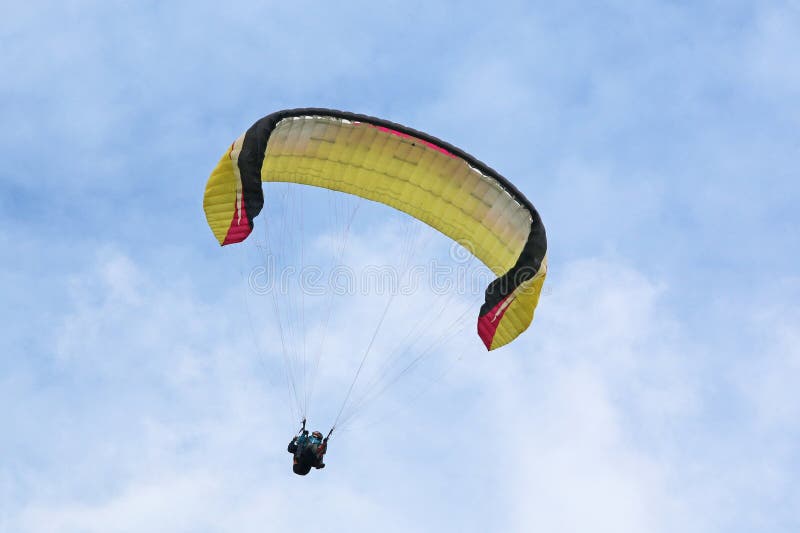 Tandem Paraglider Flying in a Blue Sky Stock Photo - Image of ...