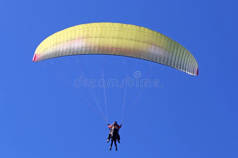 Tandem Paraglider Flying in a Blue Sky Stock Image - Image of ...