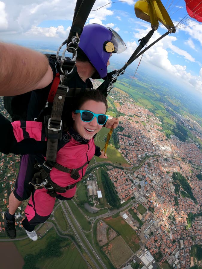A Tandem Skydive into the Clouds Stock Photo - Image of jumping, dive ...