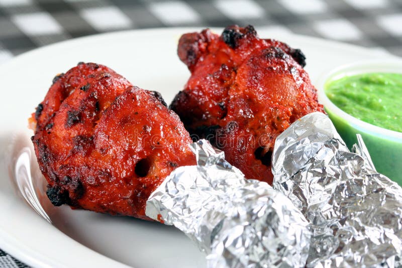 Tandoori chicken legs stock photo. Image of plate, crispy - 18927666