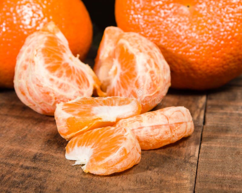 Tangelos and Sections of Fruit Stock Image - Image of tangerine ...