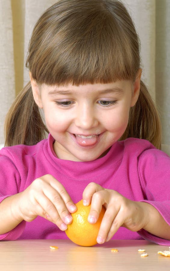 Tangerine Girl. stock photo. Image of female, face, indoors - 21944040