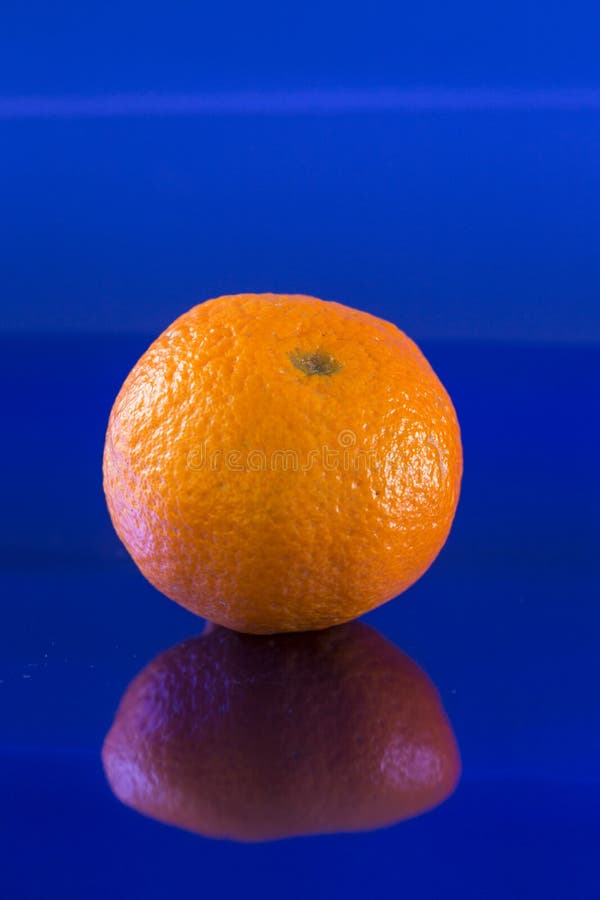 Tangerine on the Immense Blue Stock Photo - Image of color, orange ...