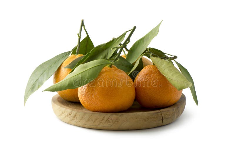 Tangerine Pieces on Wooden Table, Isolated Background Stock Photo ...