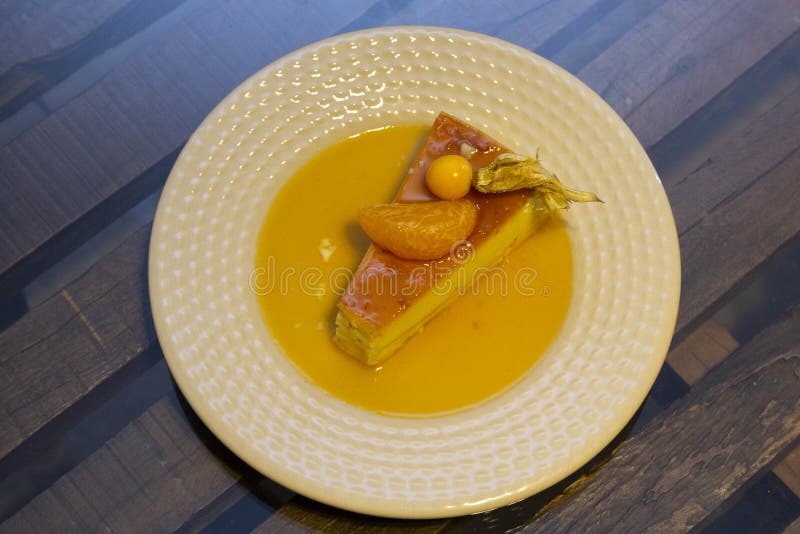 Tangerine Pudding - Caramelized Pudding Dessert with Tangerine Stock ...