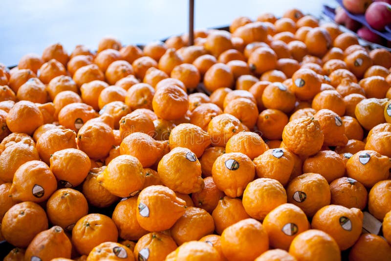 Orange Tangerines on Display Stock Photo - Image of pile, supermarket ...