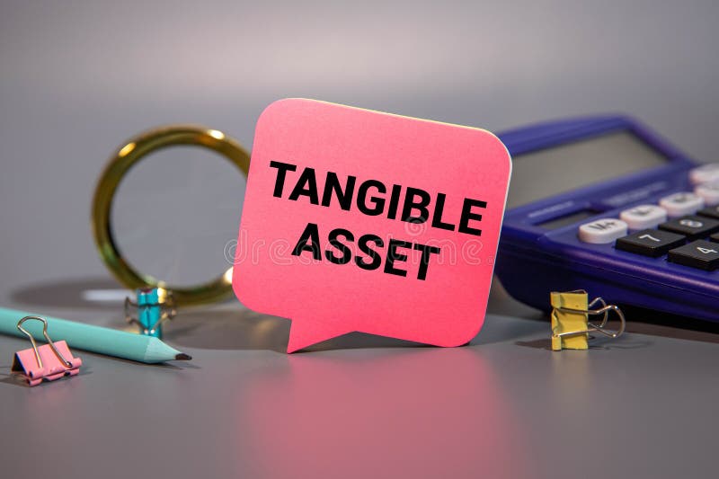 Tangible Asset Text Written on a Notebook with Pencils. Stock Image ...
