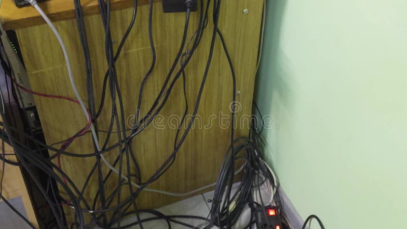 A Tangle of Electrical Wires Connected To a Power Strip, Scattered in ...