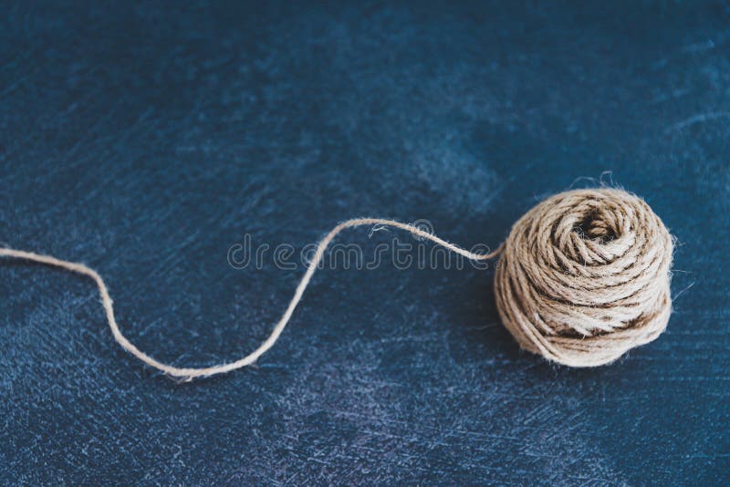 Tangled Ball of Thread with String Popping Out of it Stock Image ...