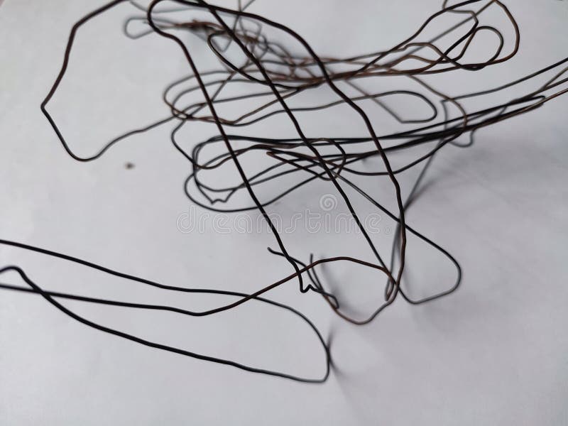 Tangled Black Wire on White Stock Image - Image of stripe, information ...