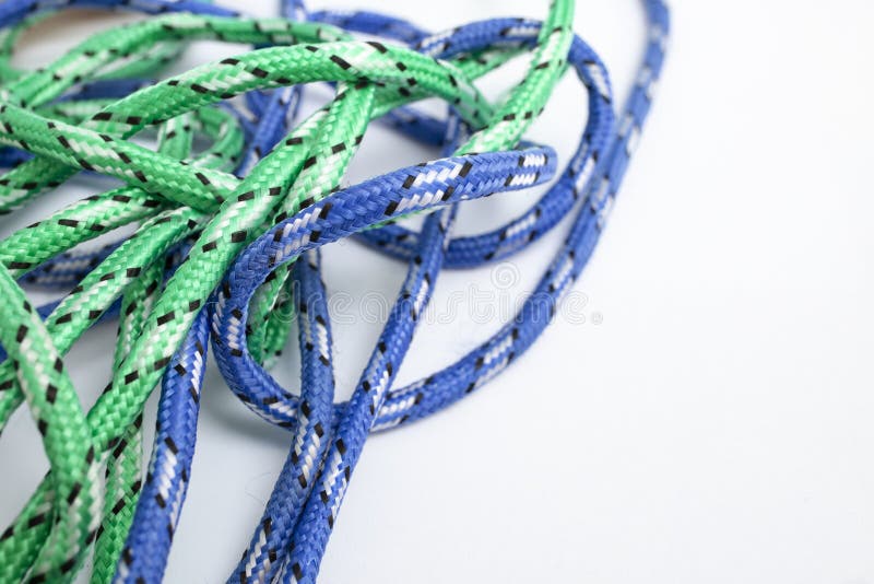 Tangled Blue and Green Strings on White Background with Copy Space ...