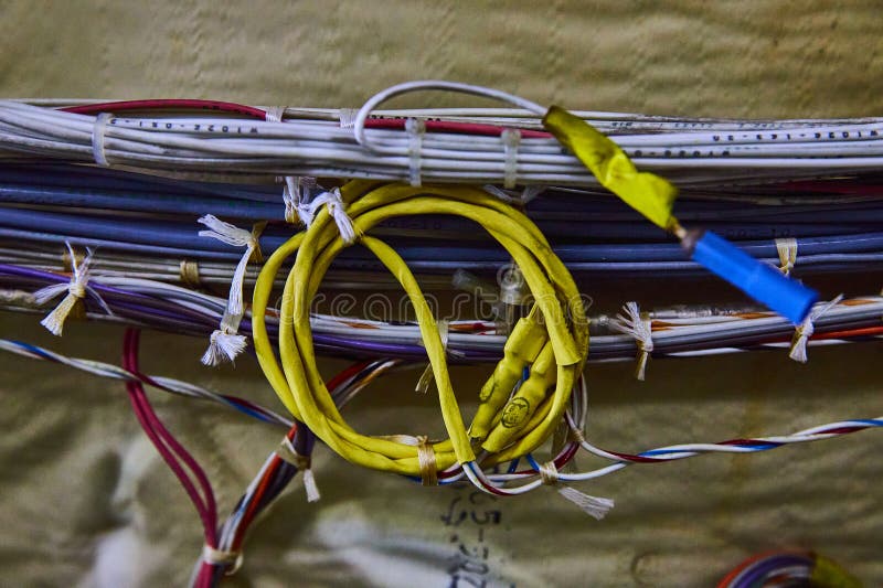 Tangled Electrical Wires Close-Up with Prominent Yellow Loop Stock ...