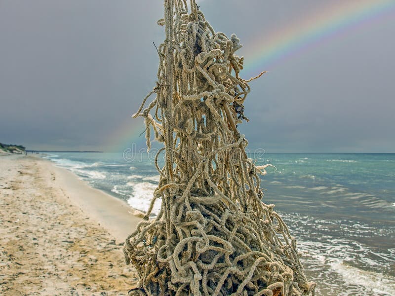 Tangled Net on the Beach on the Rainbow Background Stock Image - Image ...