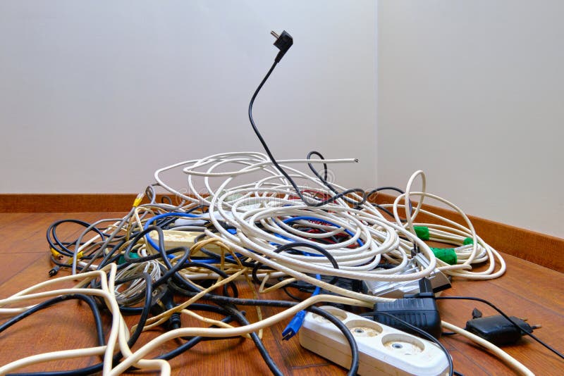 A Tangled Tangle of Unnecessary Wires Lies on the Floor Stock Photo ...