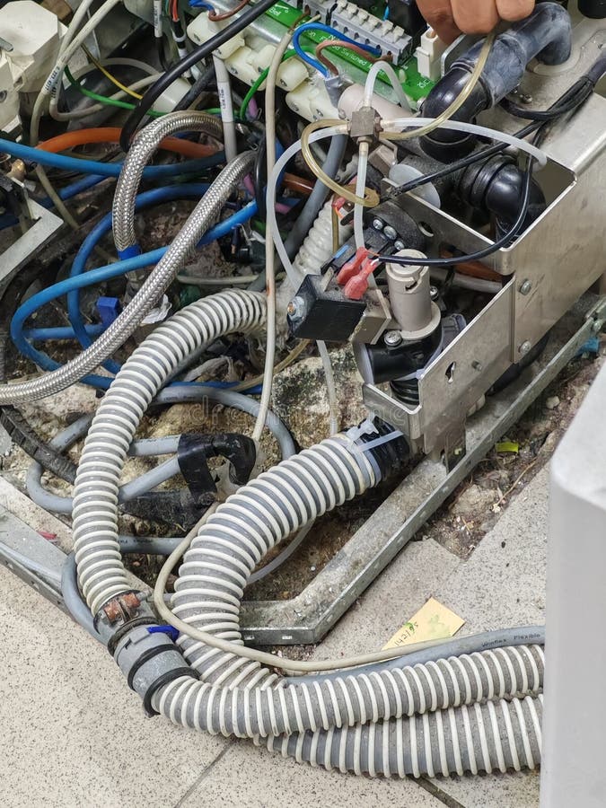 Tangled Wires and Hoses in Maintenance Work Stock Photo - Image of ...