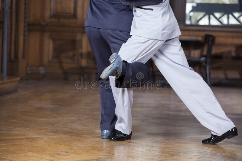 Tango Dancers Performing Gancho Step in Restaurant Stock Image - Image ...