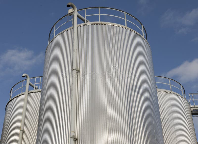 Grey oil tanks stock image. Image of pipelines, money - 2151883
