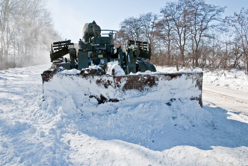 Tank Cleans the Road from Snow Stock Photo - Image of equipment ...