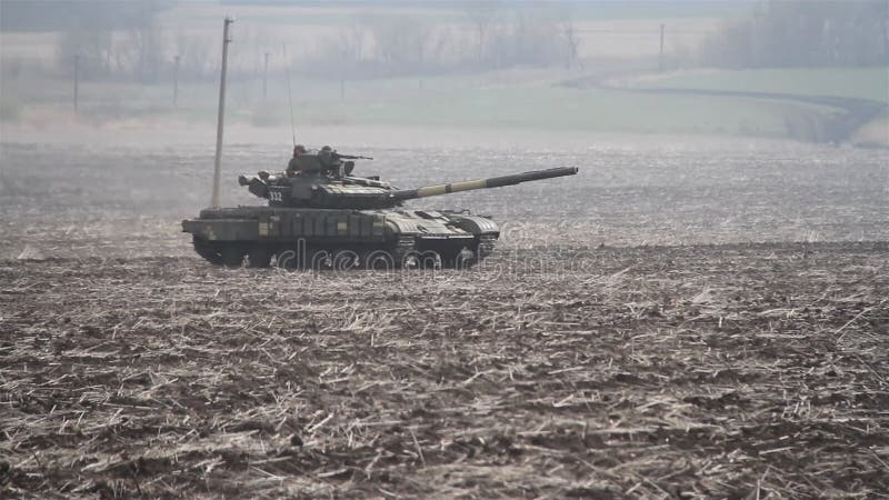 Tank Exercises at the Training Ground. Shots of Tanks in Motion. Stock ...