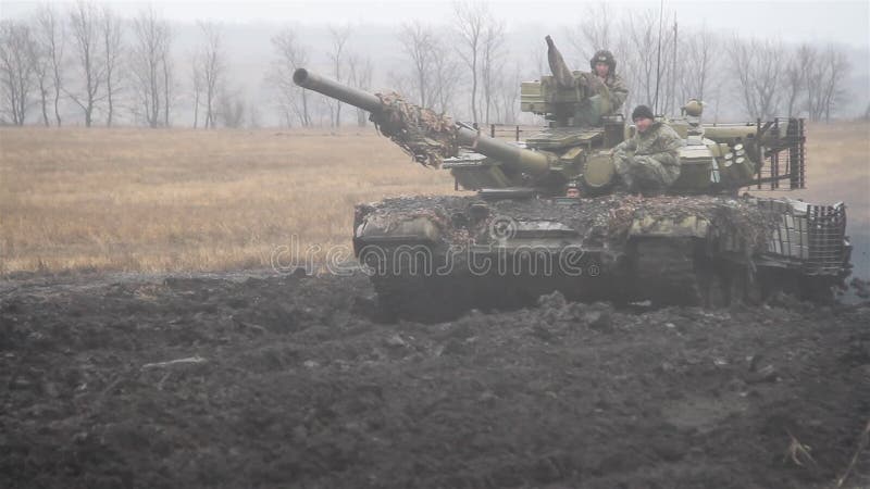Tank Exercises at the Training Ground. Shots of Tanks in Motion. Stock ...