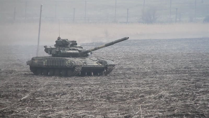 Tank Exercises at the Training Ground. Shots of Tanks in Motion. Stock ...
