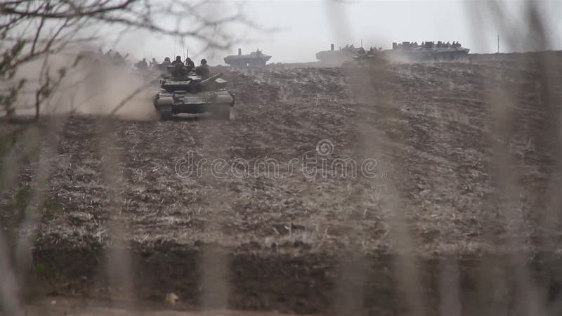 Tank Exercises at the Training Ground. Shots of Tanks in Motion. Stock ...