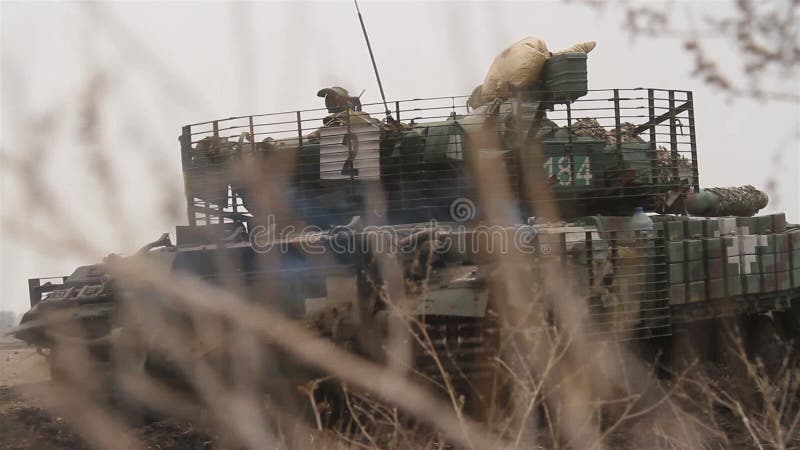 Tank Exercises at the Training Ground. Shots of Tanks in Motion. Stock ...