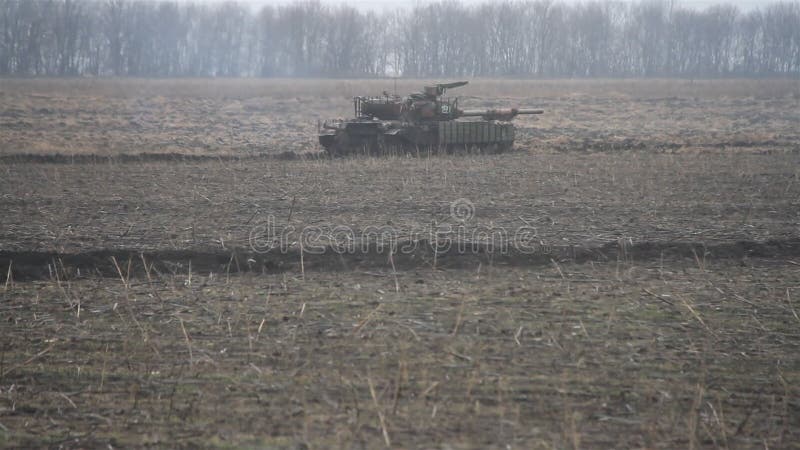 Tank Exercises at the Training Ground. Shots of Tanks in Motion. Stock ...