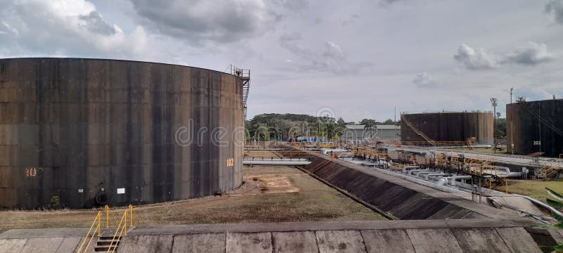 Tank Farm oil and gas stock image. Image of track, construction - 263073267