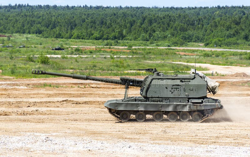 Tank on a field stock photo. Image of motor, force, forest - 57300802