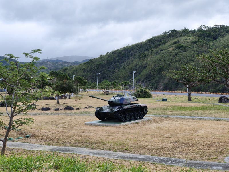 Tank in a Field with Mountain Backdrop Editorial Photography - Image of ...