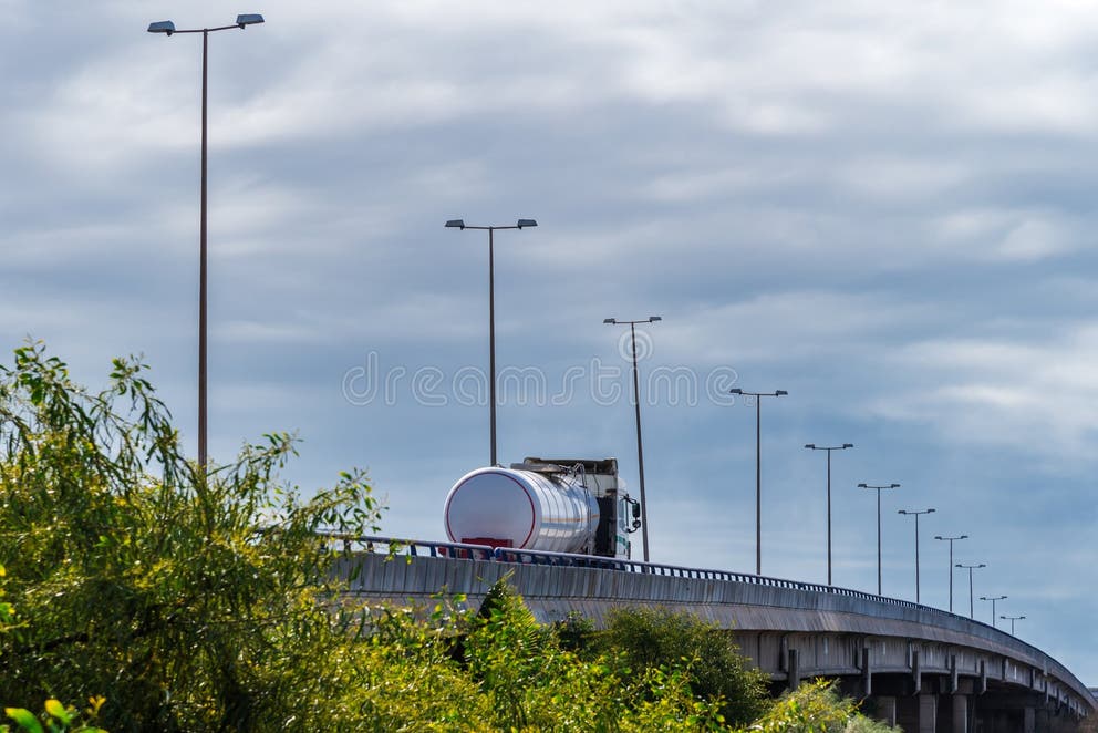 Tank Truck Circulating through a Long, Back View Stock Image - Image of ...