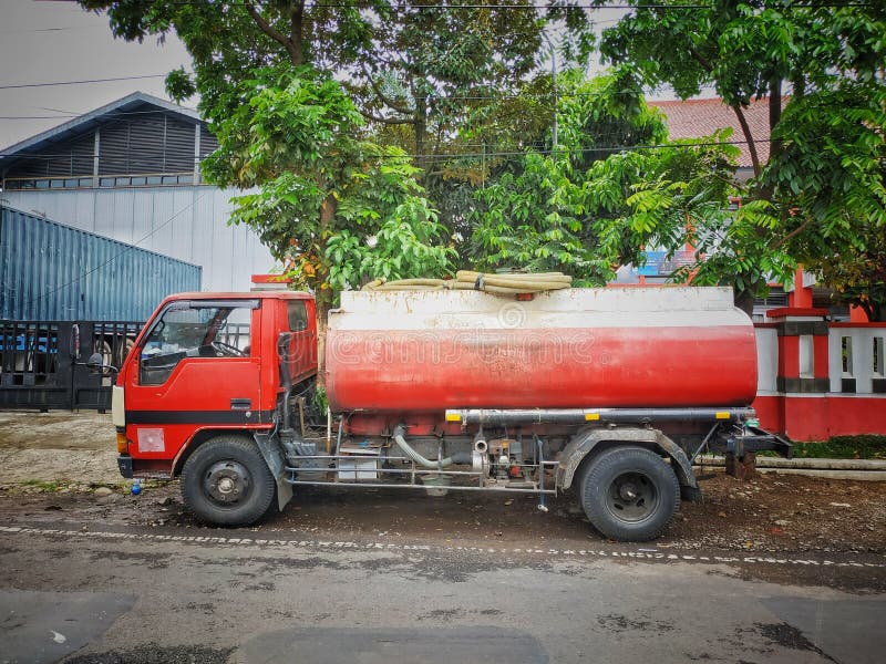 Tank Truck Parked on the Side of the Road. Stock Photo - Image of side ...
